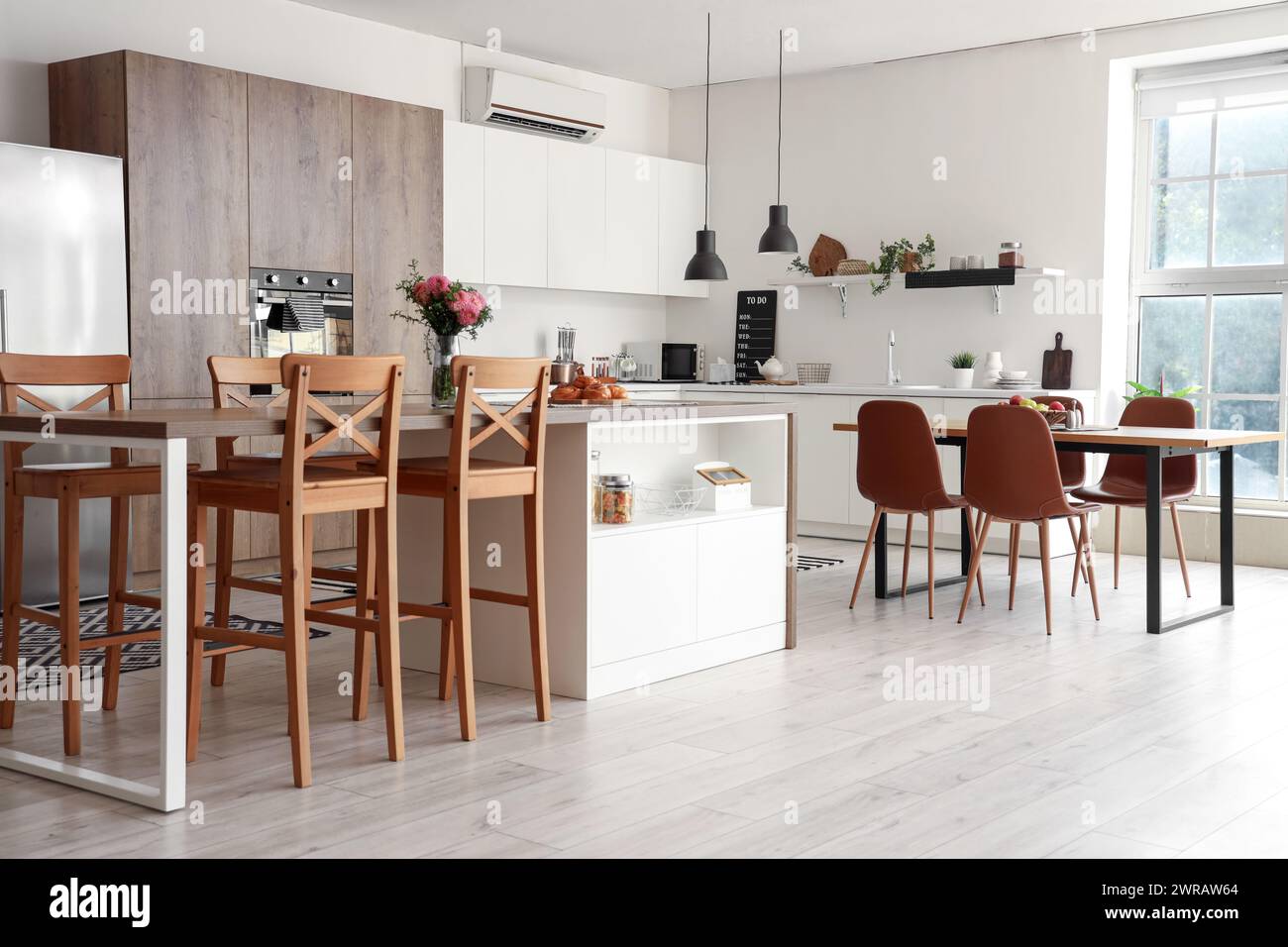 Interior of kitchen with counters and tables Stock Photo - Alamy