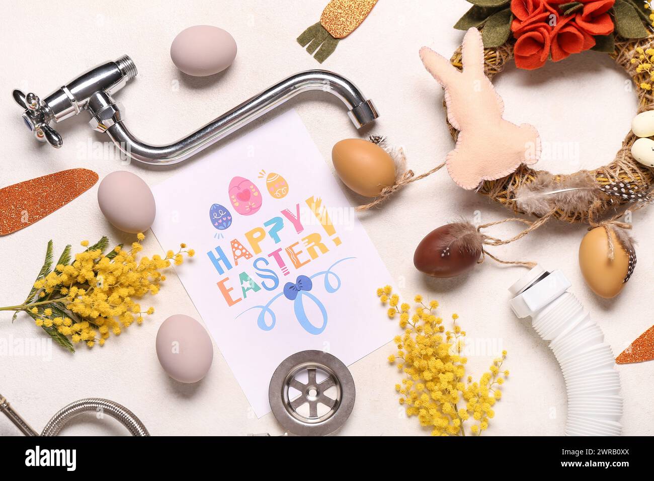 Composition with greeting card, plumber's items and beautiful Easter ...