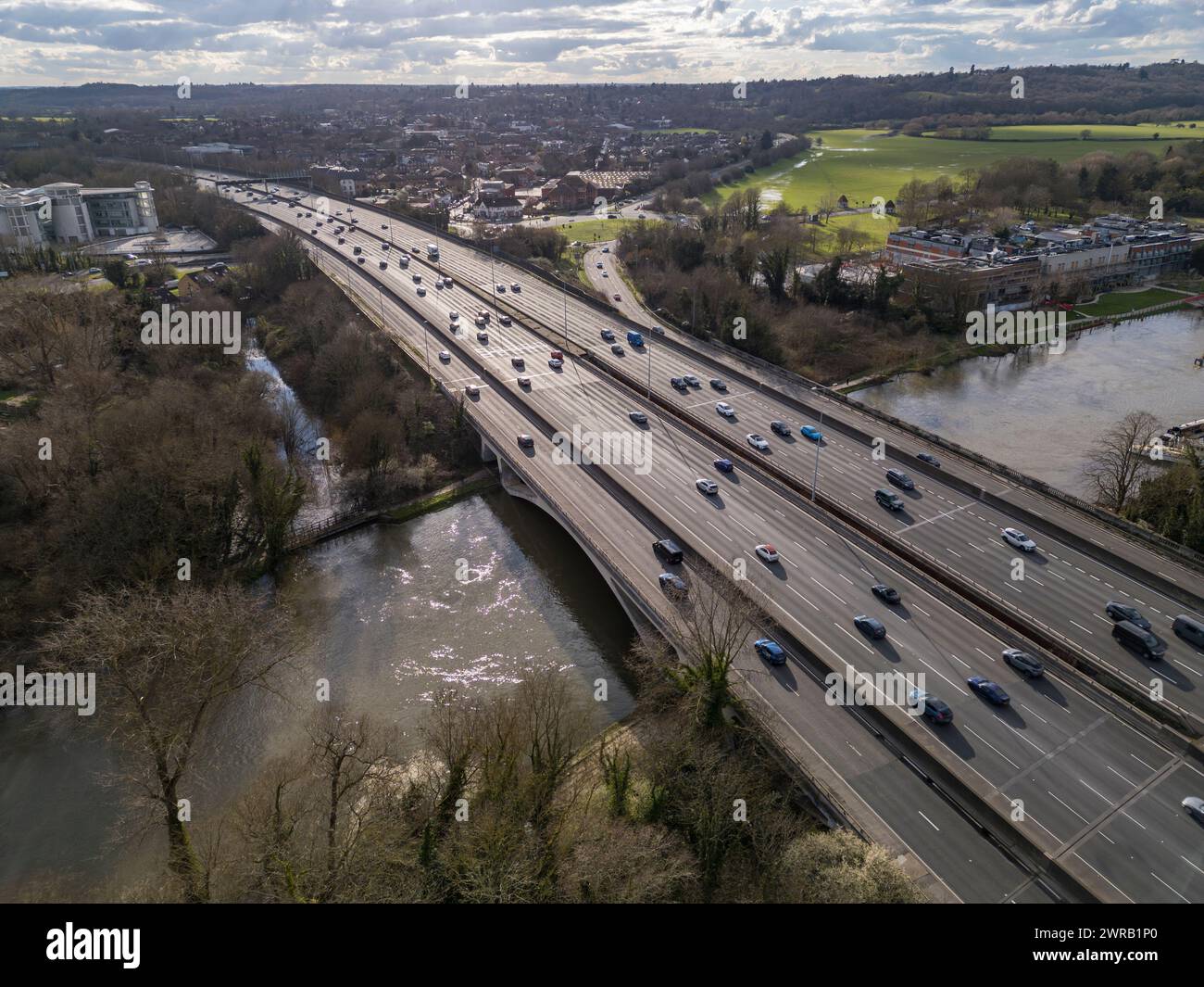 Aerial view of the M25 motorway crossing the River Thames near ...