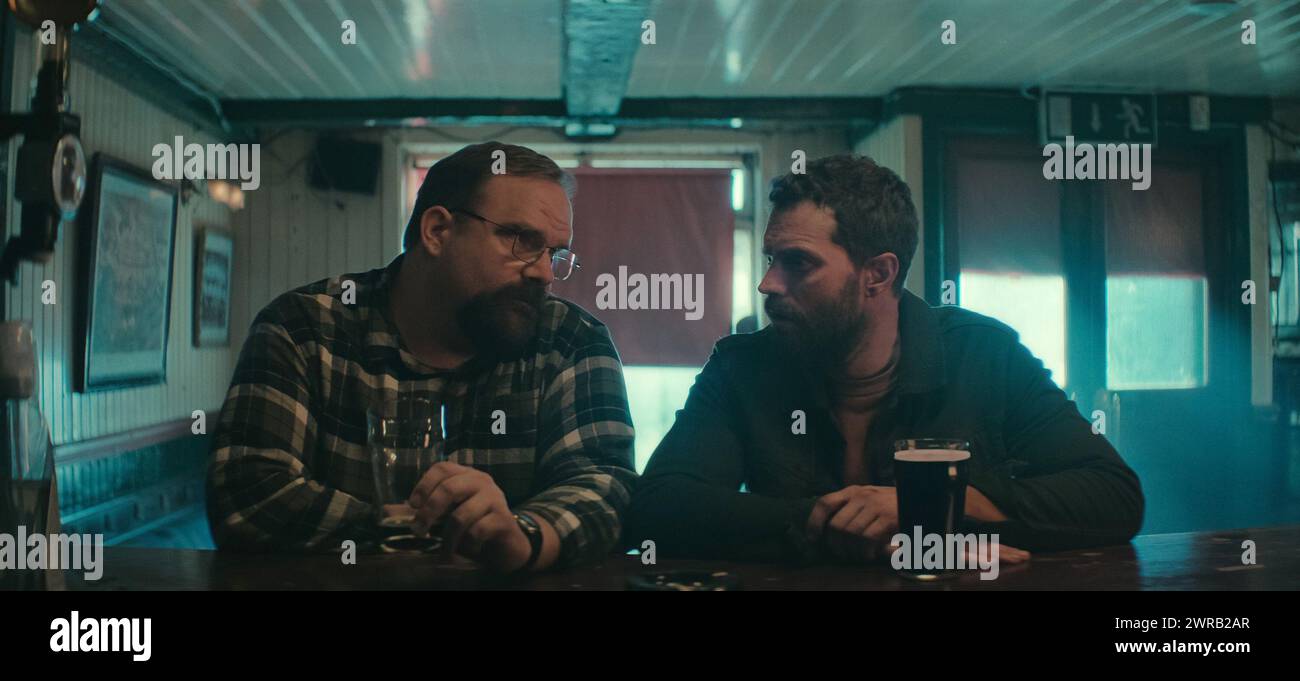 THE TOURIST, from left: Greg Larsen, Jamie Dornan, (Season 2, ep. 203, aired Feb. 29, 2024 ...