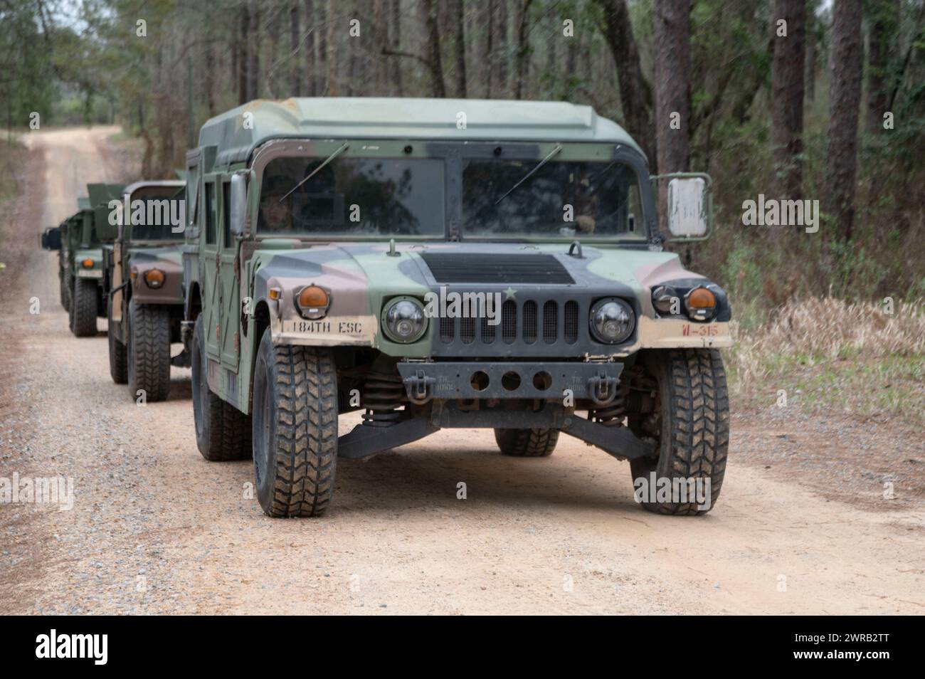 Humvees transport Coast Guardsmen from Port Security Unit 308 and U.S ...