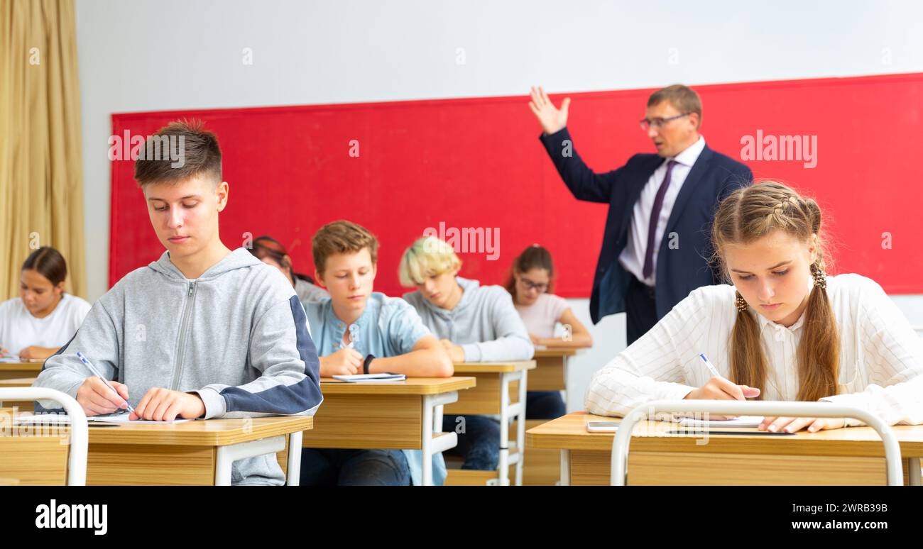 Teacher tells an interesting lecture in free communication with ...