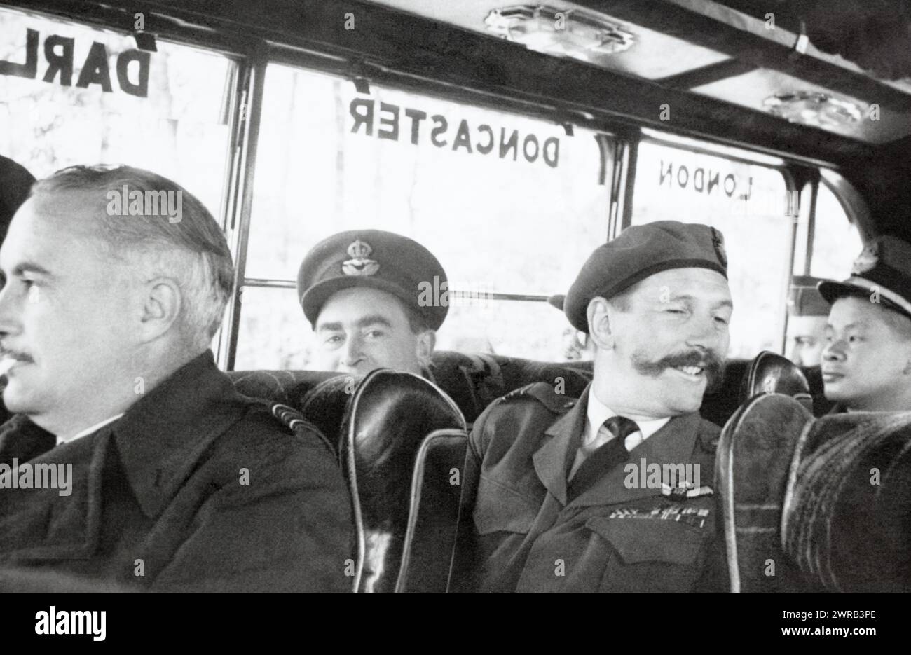 Royal Air Force officers taking a bus on a Staff College outing, 1953 ...