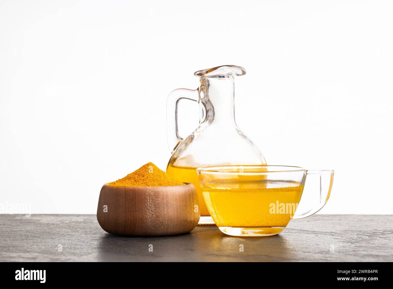 Mixture of water with turmeric powder - Curcuma longa tea Stock Photo ...