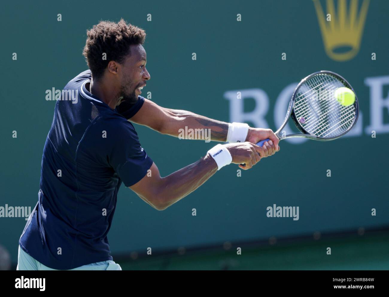 March 11, 2024 Gael Monfils of France returns a shot against Cameron ...