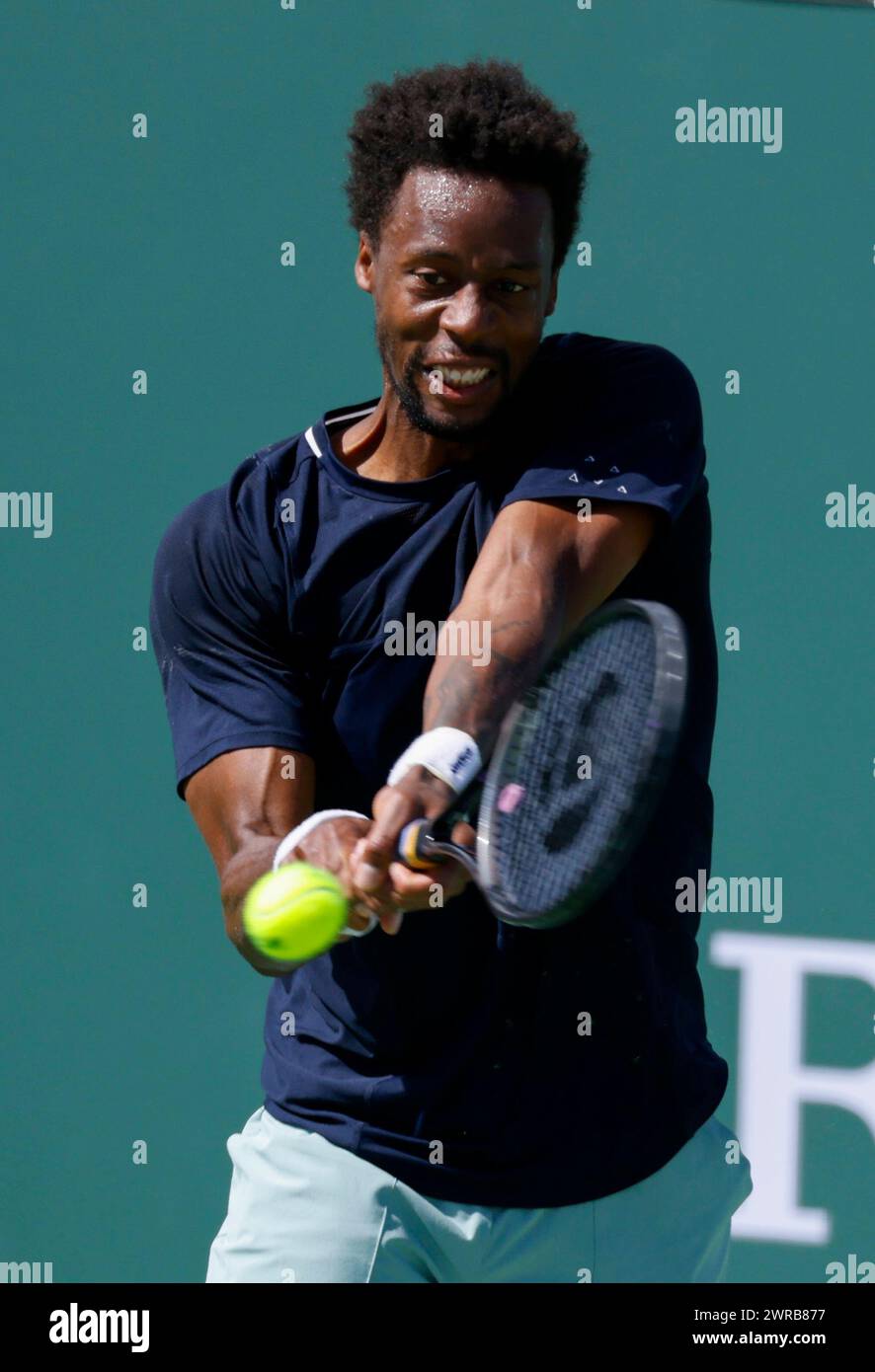 March 11, 2024 Gael Monfils of France returns a shot against Cameron ...