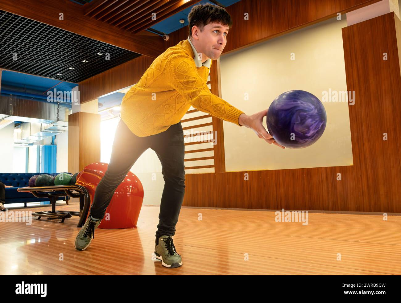 Bowling player in alley hi-res stock photography and images - Alamy