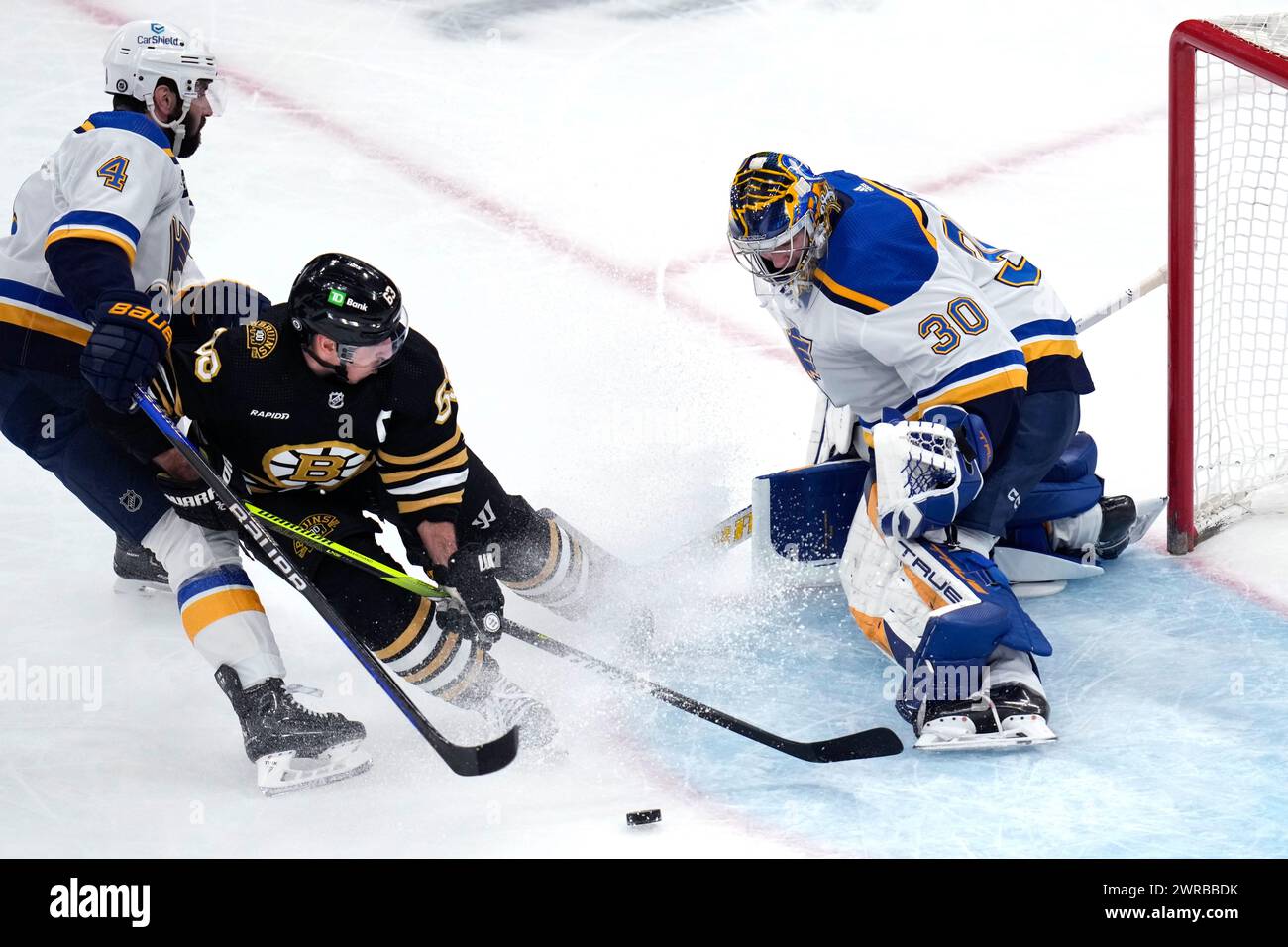 St. Louis Blues goaltender Joel Hofer (30) makes a save on a shot by ...