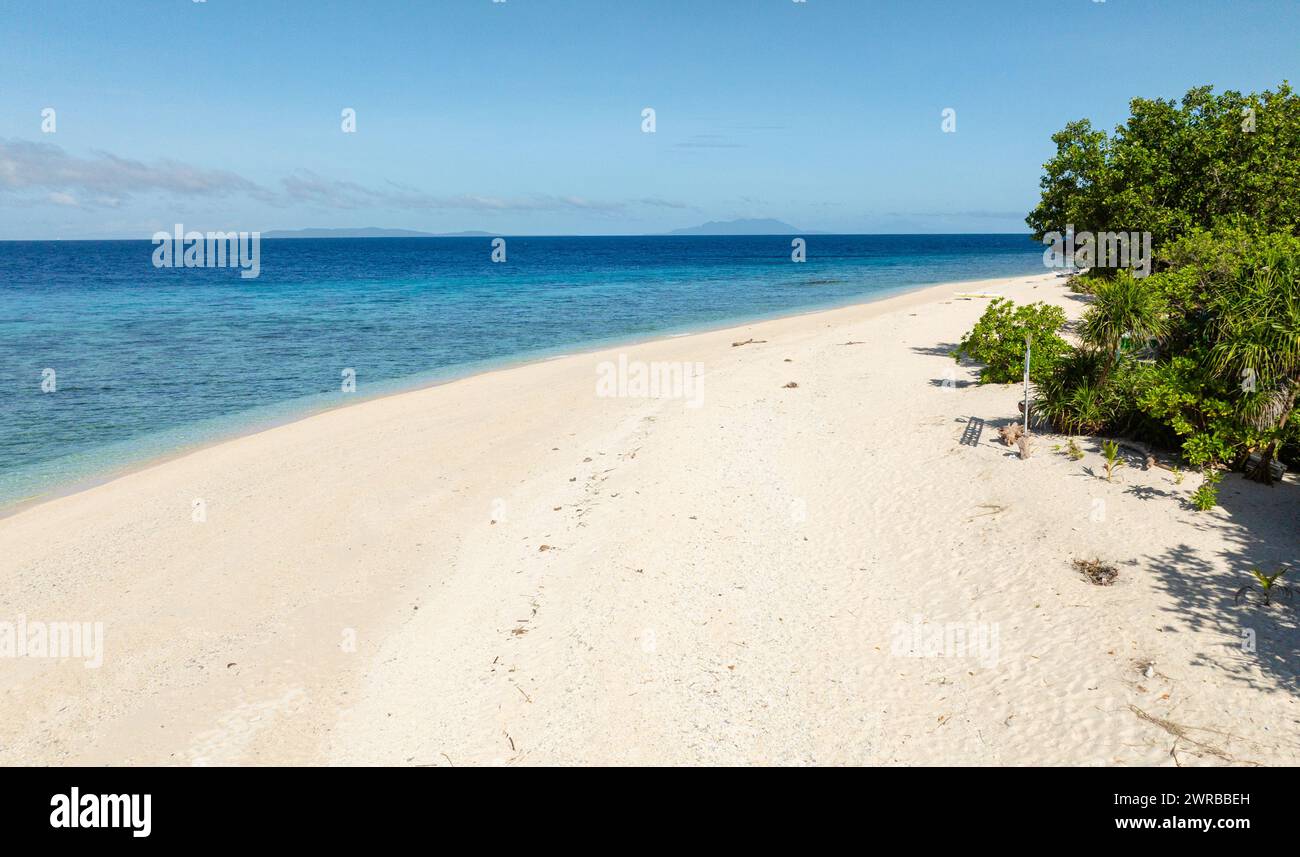 Beautiful white sand beach with clear water and waves in Cobrador ...
