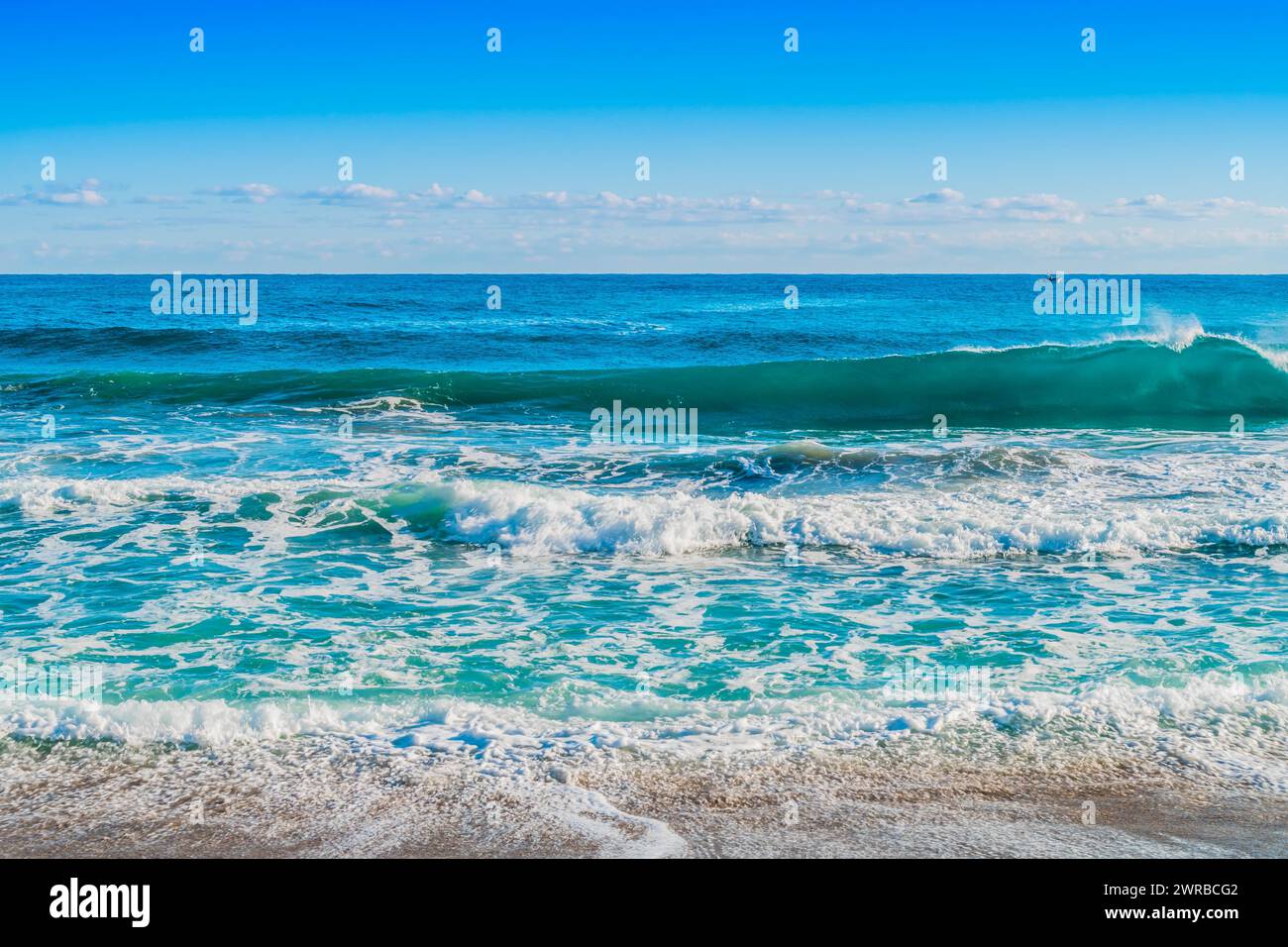 Vibrant ocean waves with rich blue tones and white surf, in South Korea ...