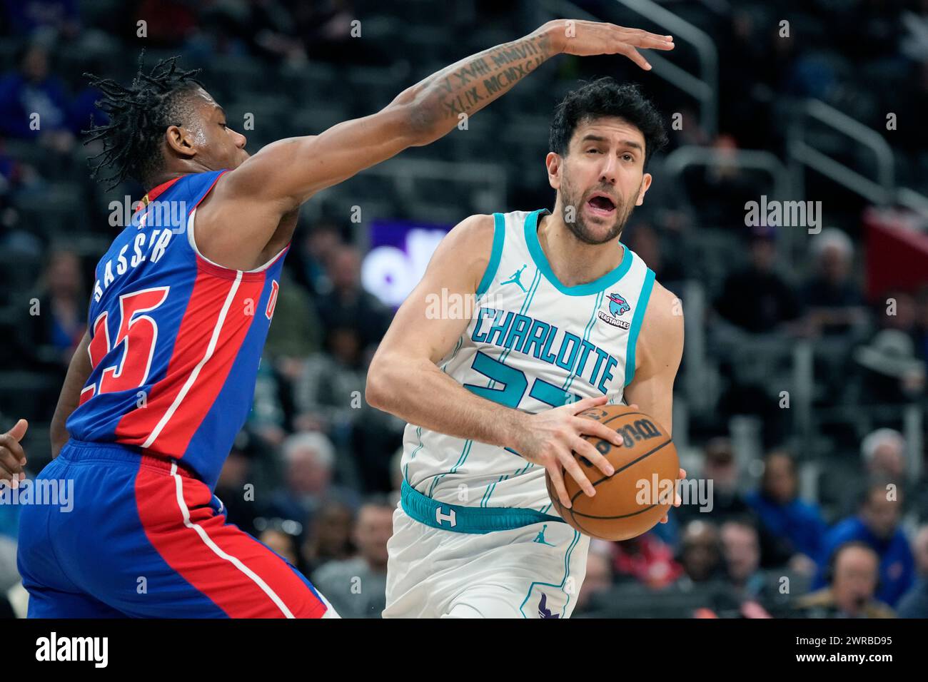 Detroit Pistons guard Marcus Sasser (25) reaches in on Charlotte ...