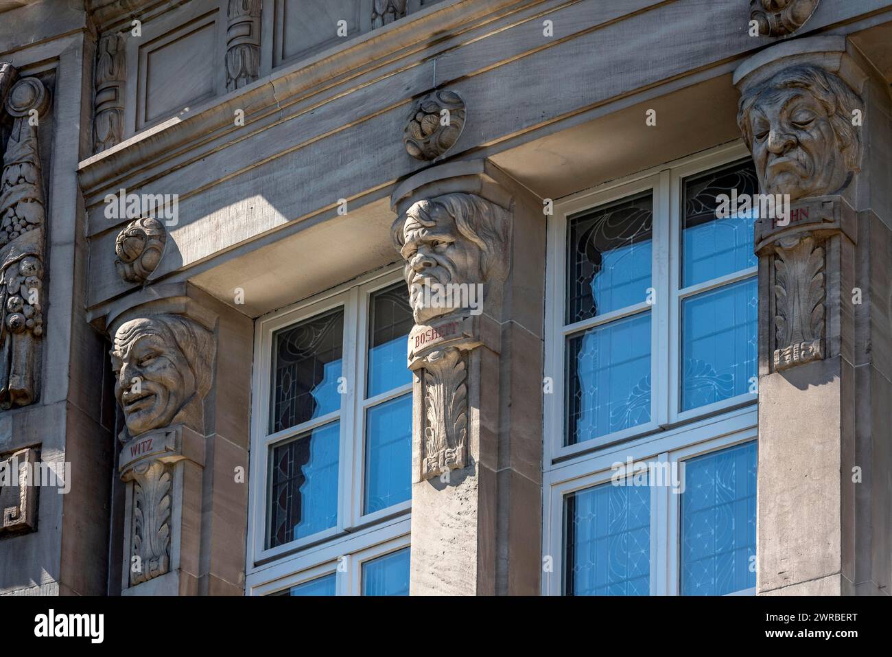 Allegorical reliefs, heads for wit, malice, mockery, Giessen City ...