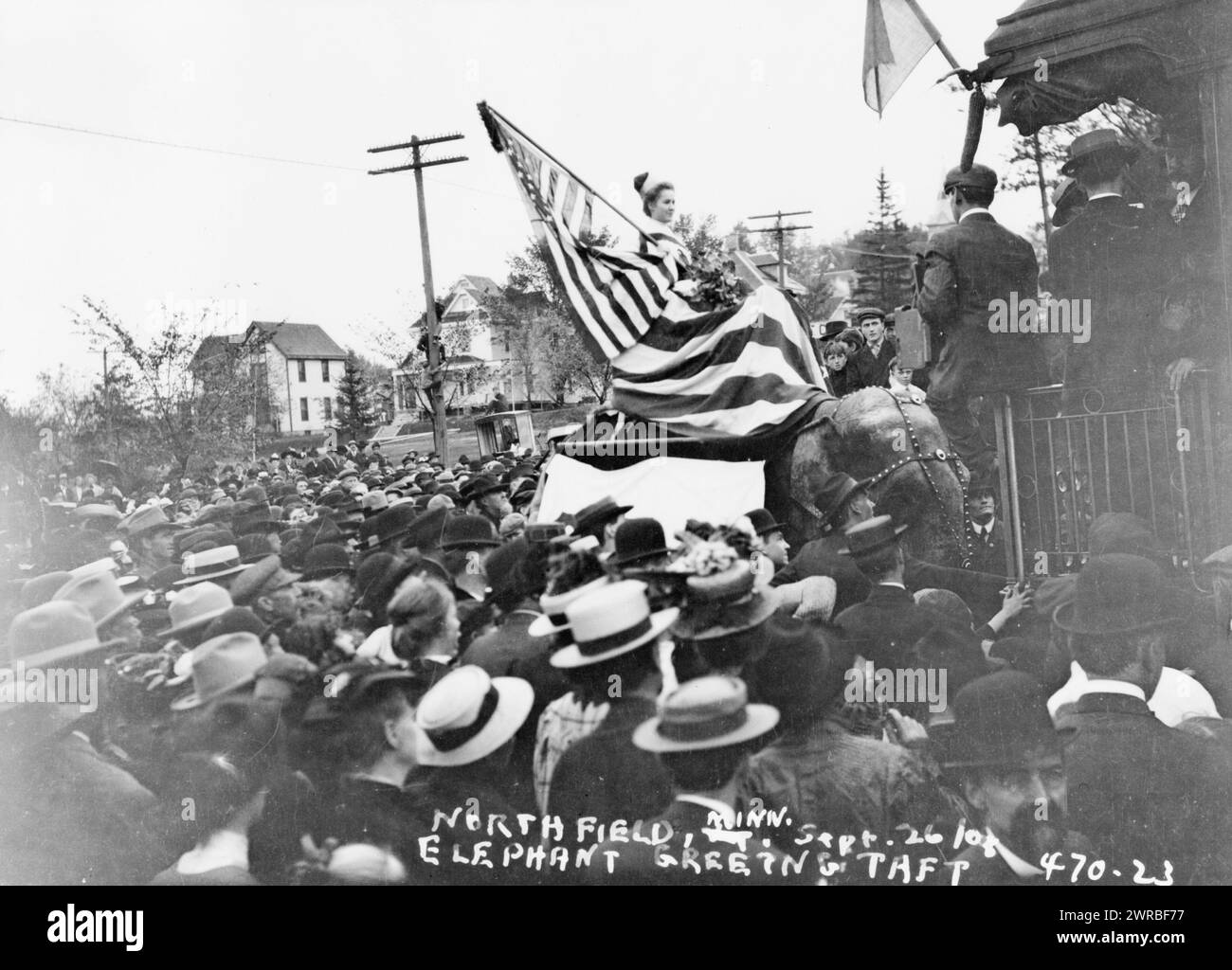 Northfield, Minn. Elephant greeting Taft. Sept. 26, Woman with flag on ...
