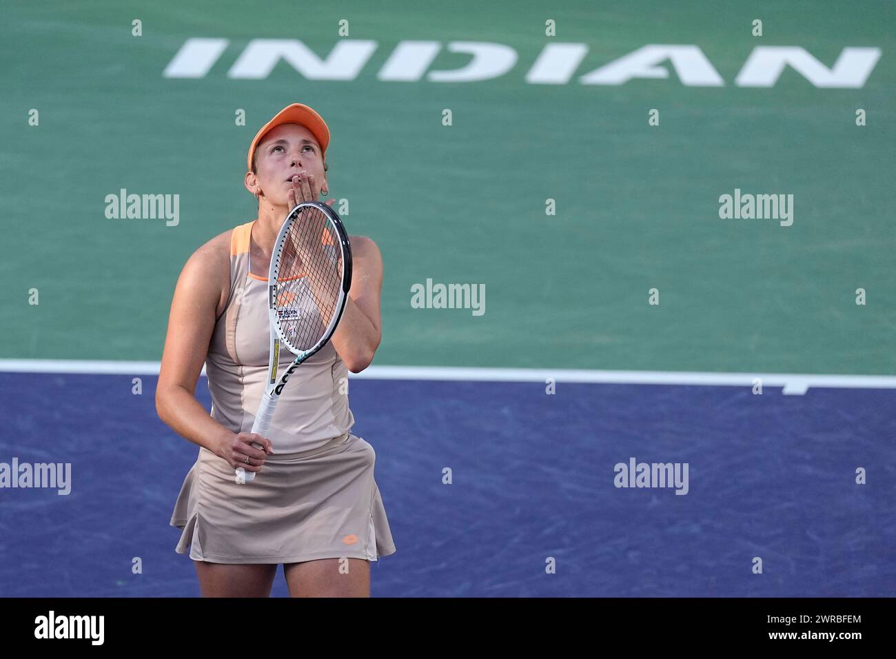 Elise Mertens, of Belgium, celebrates after defeating Naomi Osaka, of ...