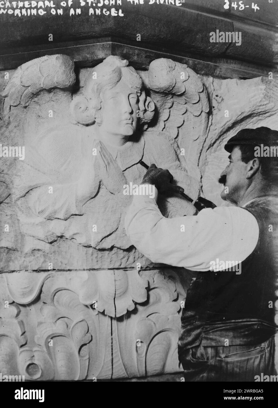 Cathedral of St. John the Divine - working on an angel, Man making head ...