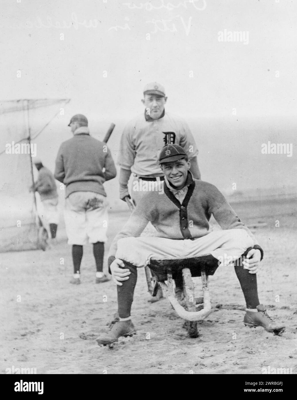 Tiger Jack Onslow pushes wheelbarrow containing Ossie Vitt, 3/20/1912 ...