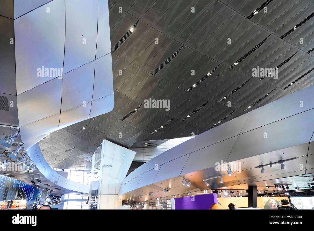 Interior view of a building with shiny ceilings and shops, BMW WELT ...