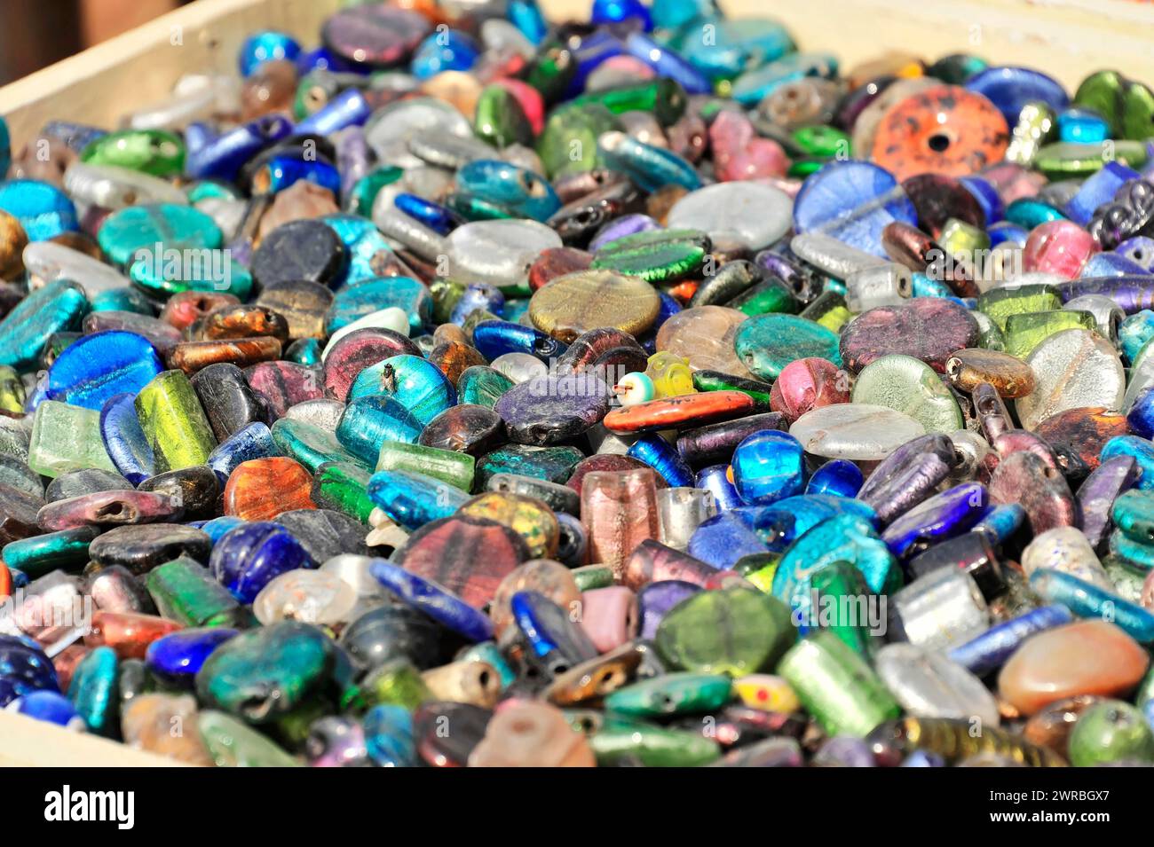 Colourful stones, different sizes and colours that shine, Varanasi ...