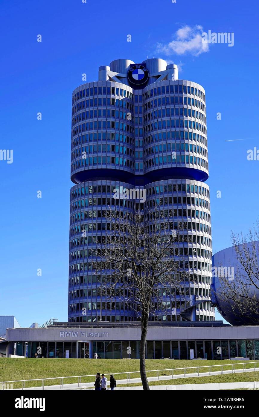 BMW main building, known as the 'four-cylinder', against a clear sky ...