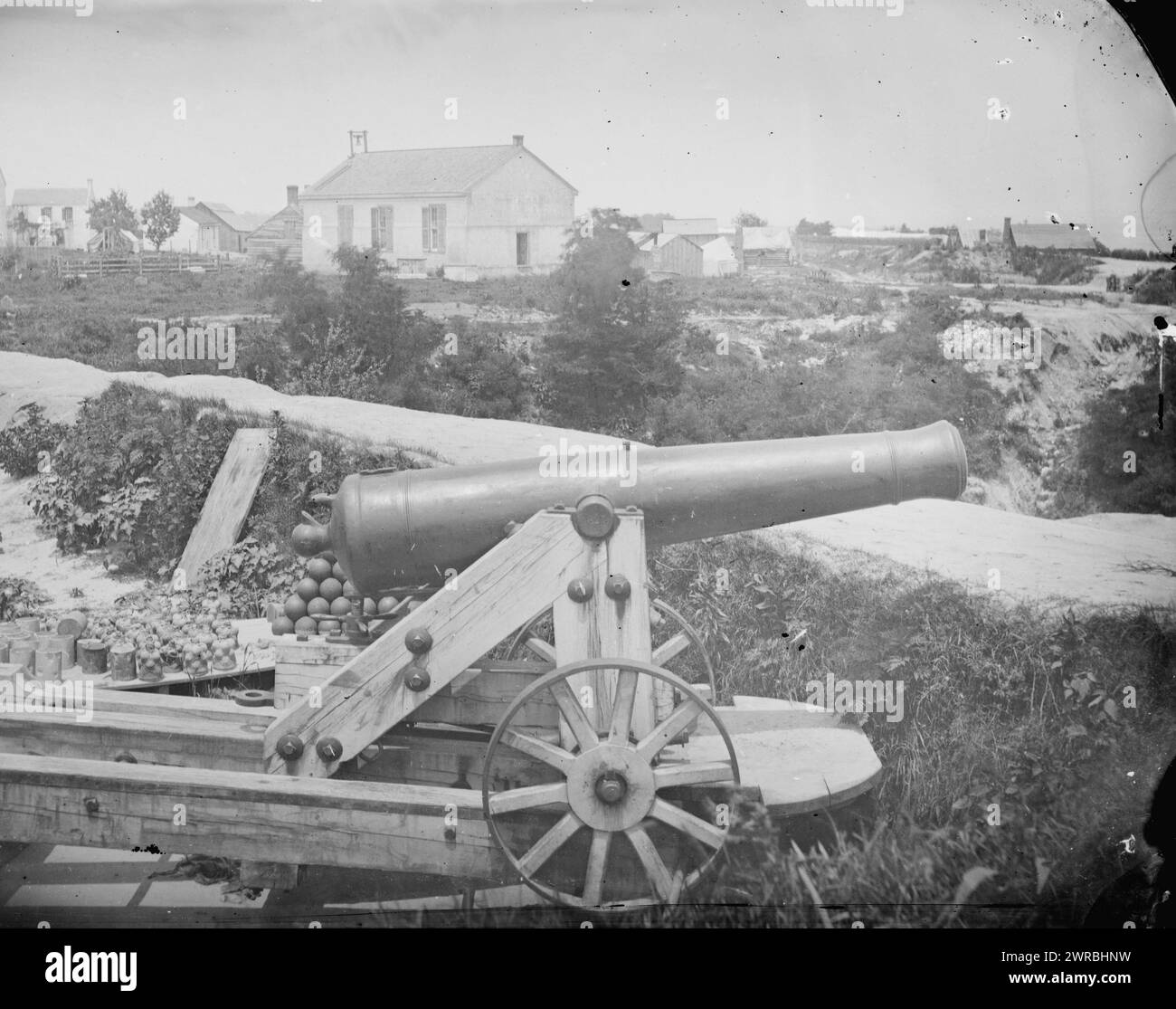 Yorktown, Va. Confederate naval gun; in background is Nelson Church ...
