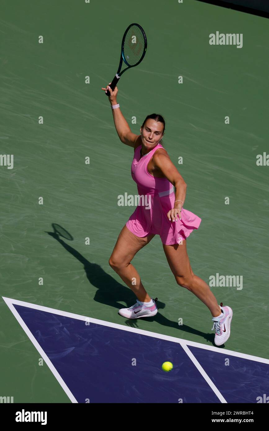 March 11, 2024 Aryna Sabalenka returns a shot against Emma Raducanu of Great Britain during the ...