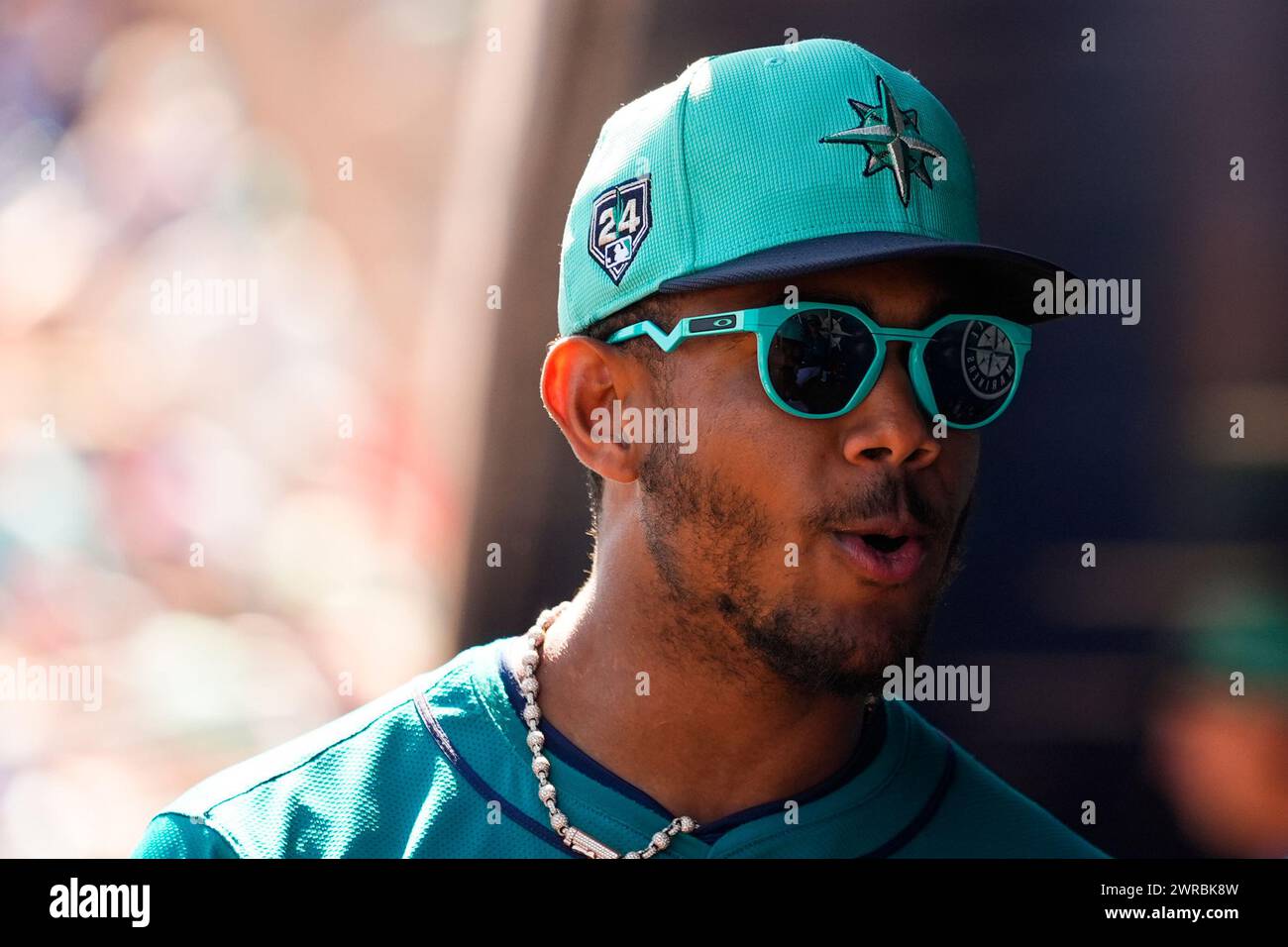 Seattle Mariners center fielder Julio Rodríguez reacts in the dugout ...