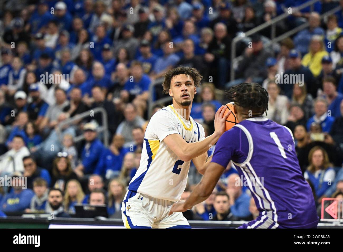 South Dakota State Jackrabbits guard Zeke Mayo (2) looks to pass the ...