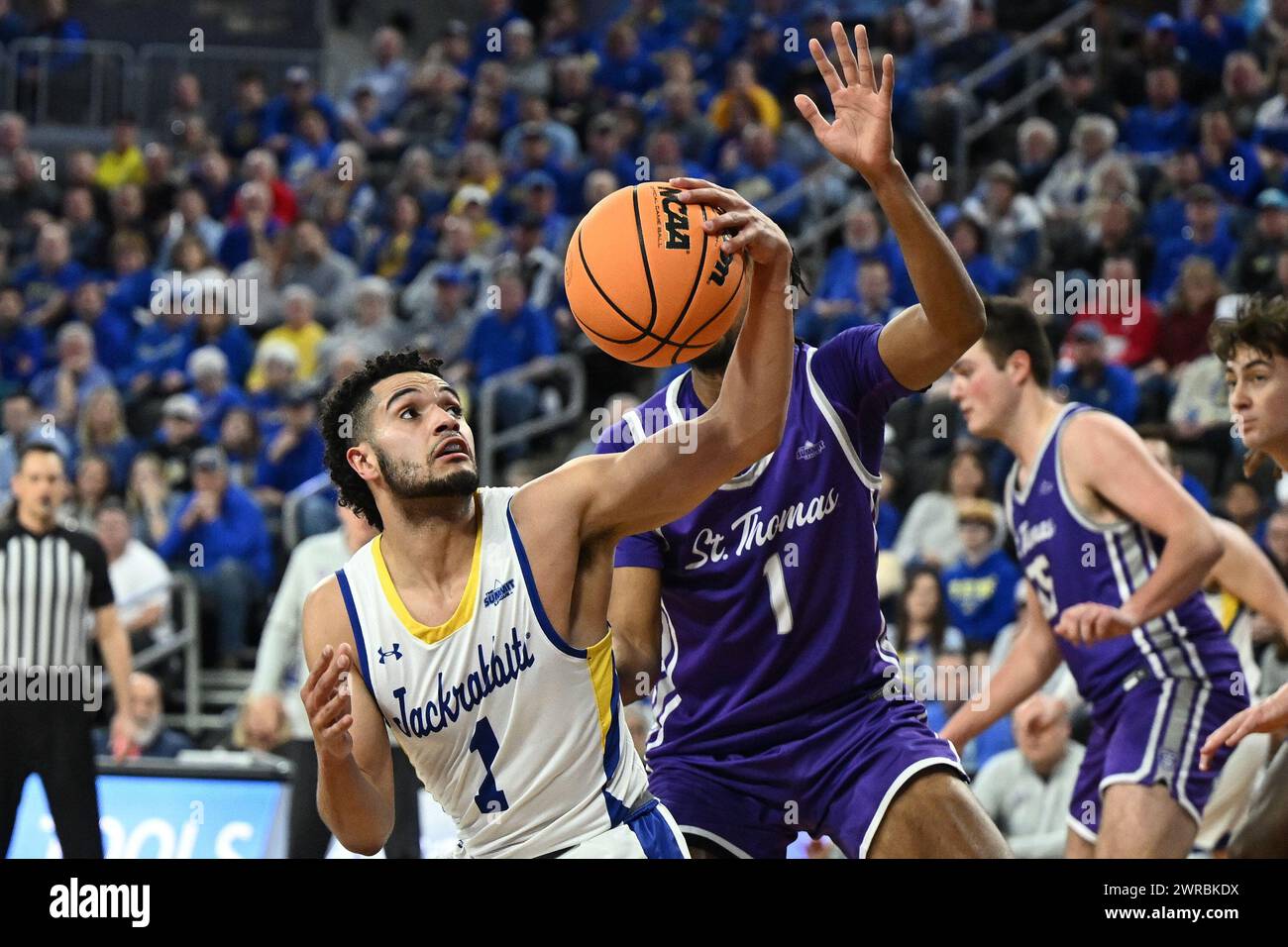 South Dakota State Jackrabbits guard Matt Mims (1) grabs a rebound ...