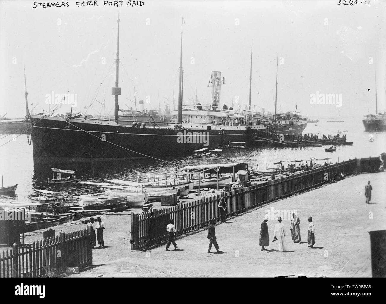 Steamers enter Port Said, Photograph shows large steamship at Port Said ...