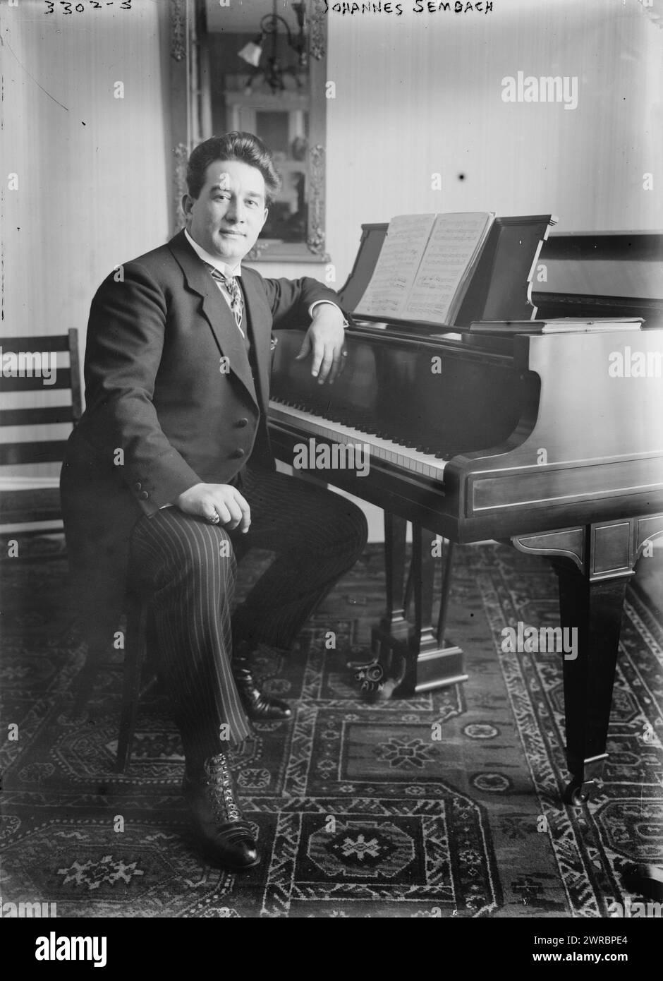 Johannes Sembach at piano, Photograph shows German opera singer ...