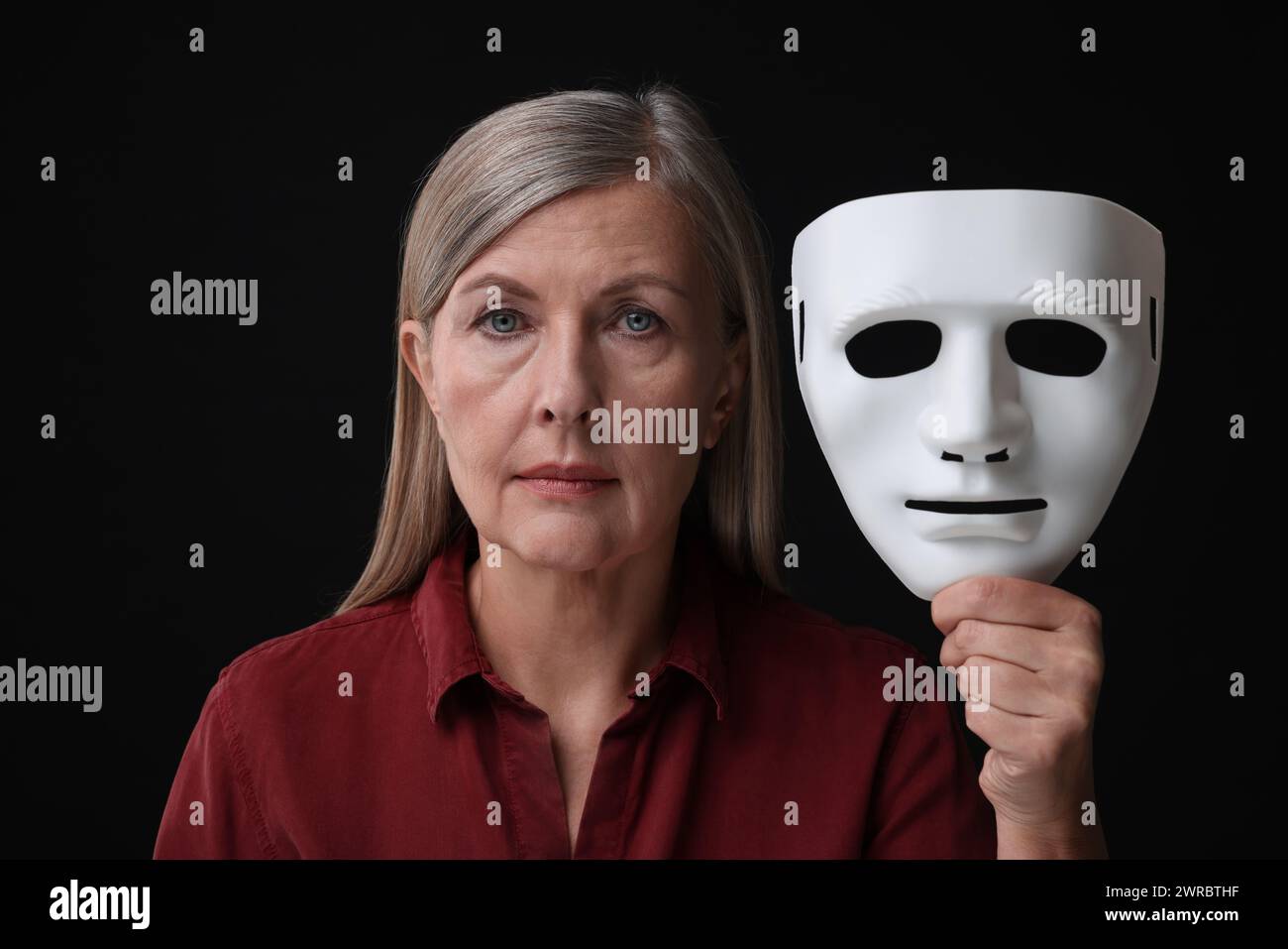 Multiple personality concept. Woman with mask on black background Stock ... Multiple personality concept. Woman with mask on black background Stock ...