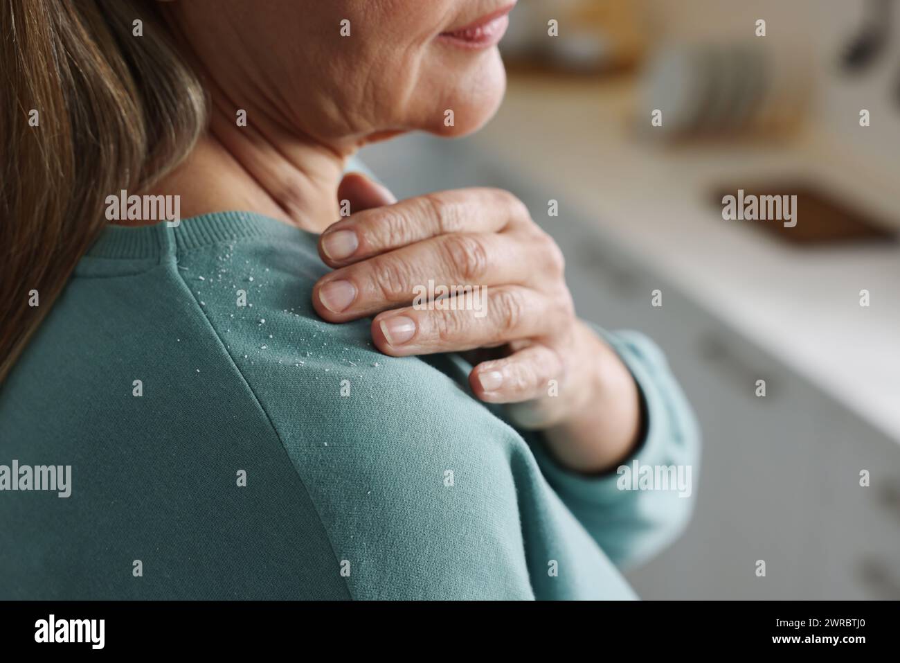 Woman brushing off skin hi-res stock photography and images - Alamy
