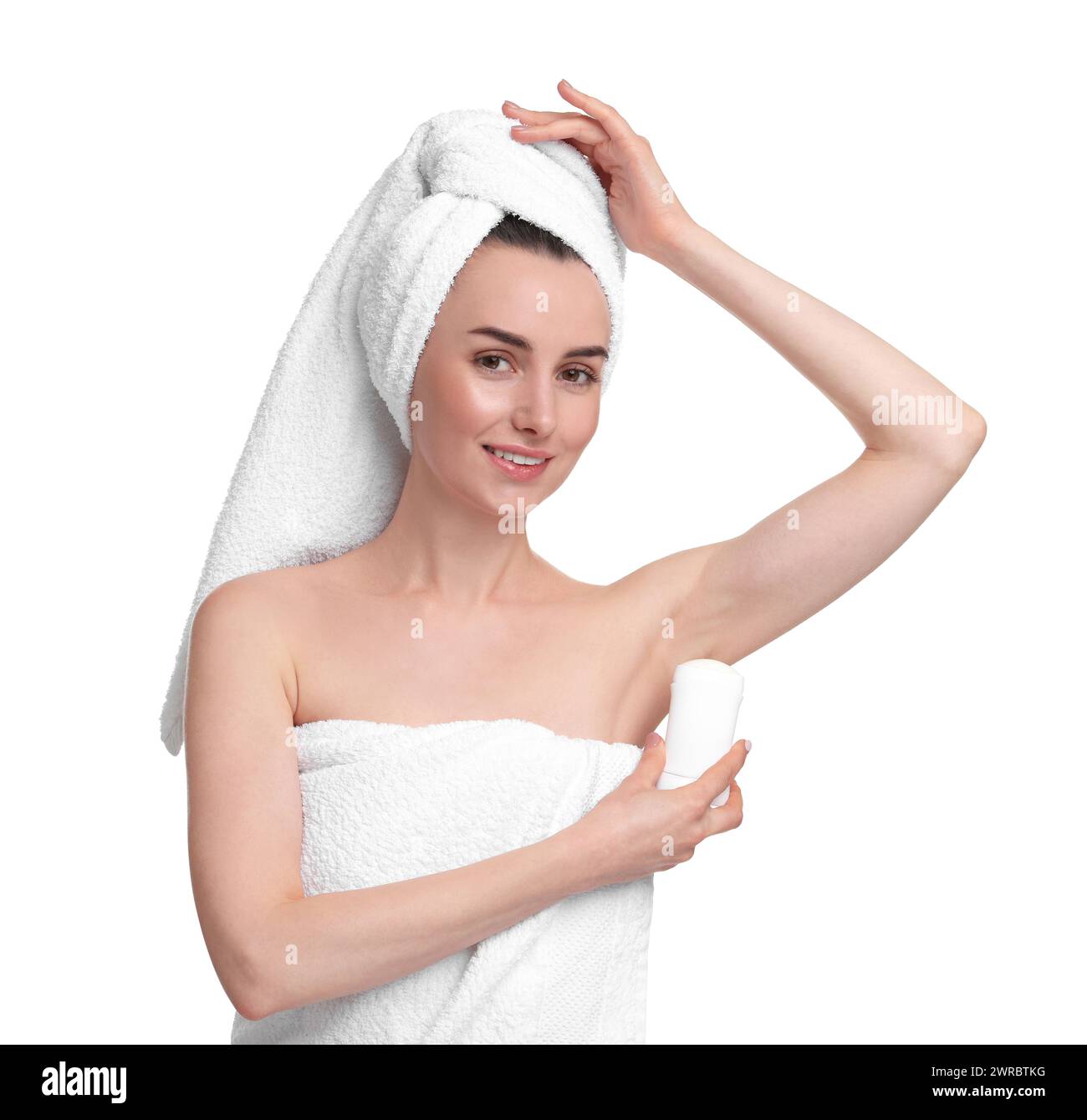 Beautiful woman applying deodorant on white background Stock Photo - Alamy