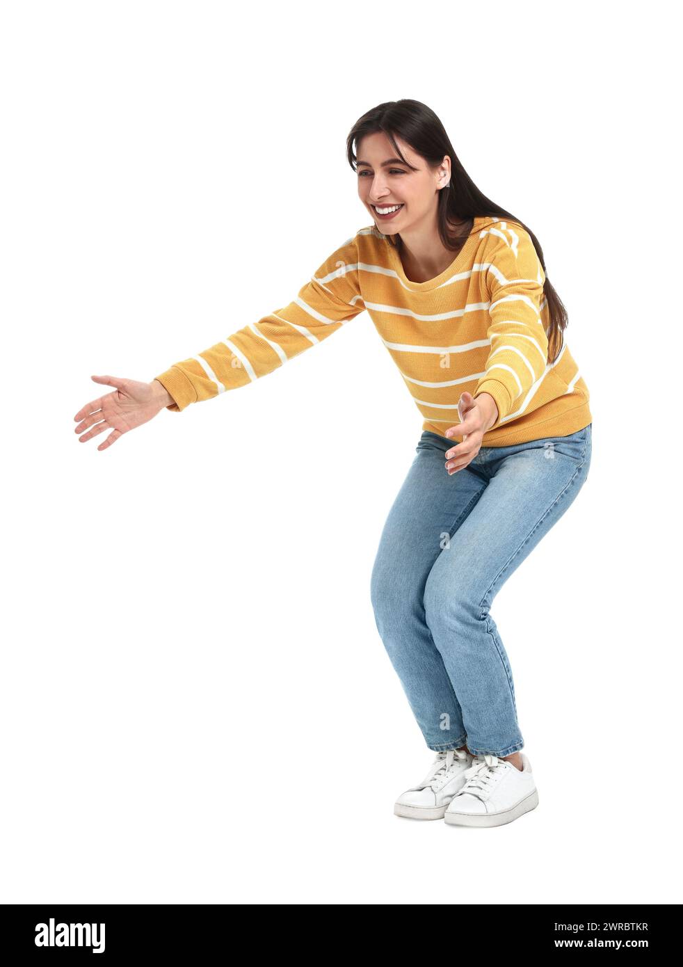 Happy woman greeting someone on white background Stock Photo - Alamy