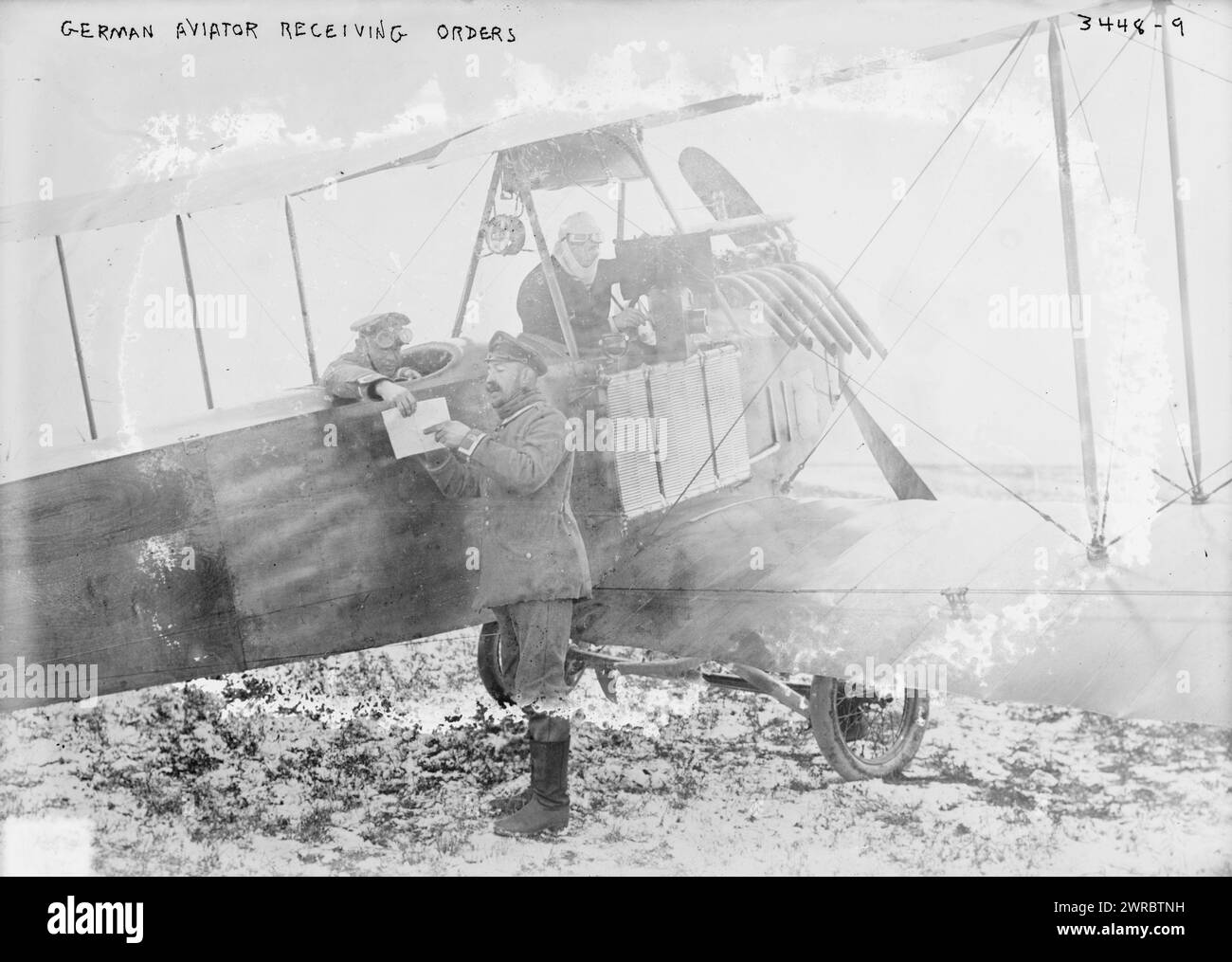 German aviator receiving orders, Photograph shows a German pilot in an ...