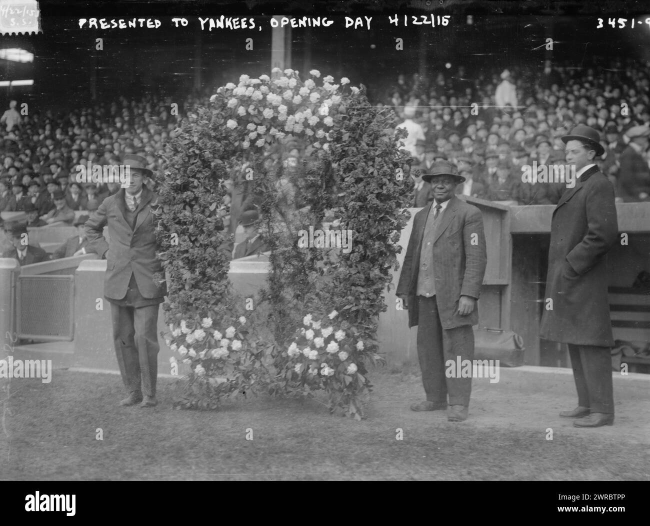 Presented to Yankees, opening day, 4/22/15, Photograph shows a floral ...