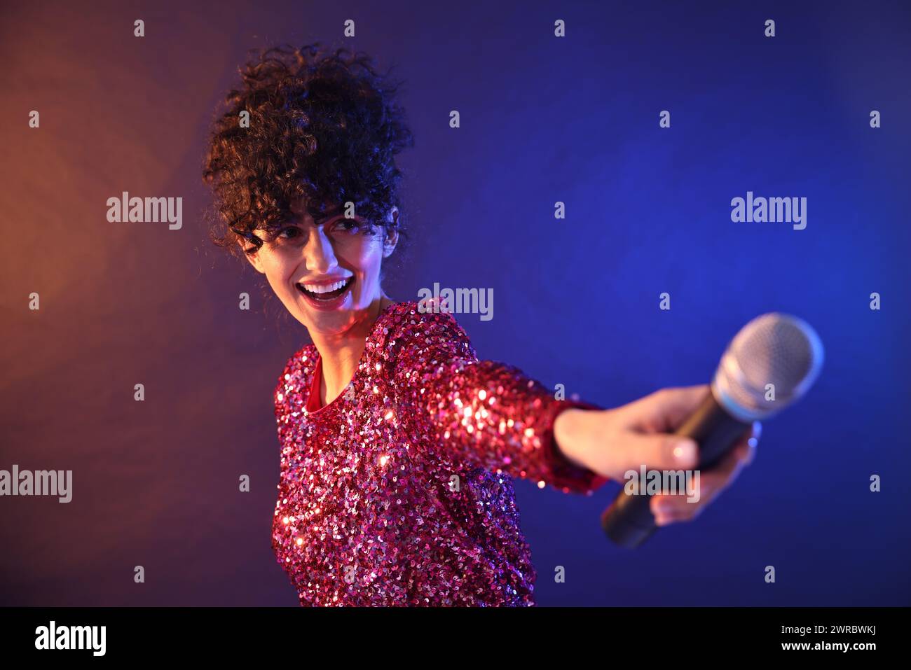 Beautiful young female singer in hi-res stock photography and images ...