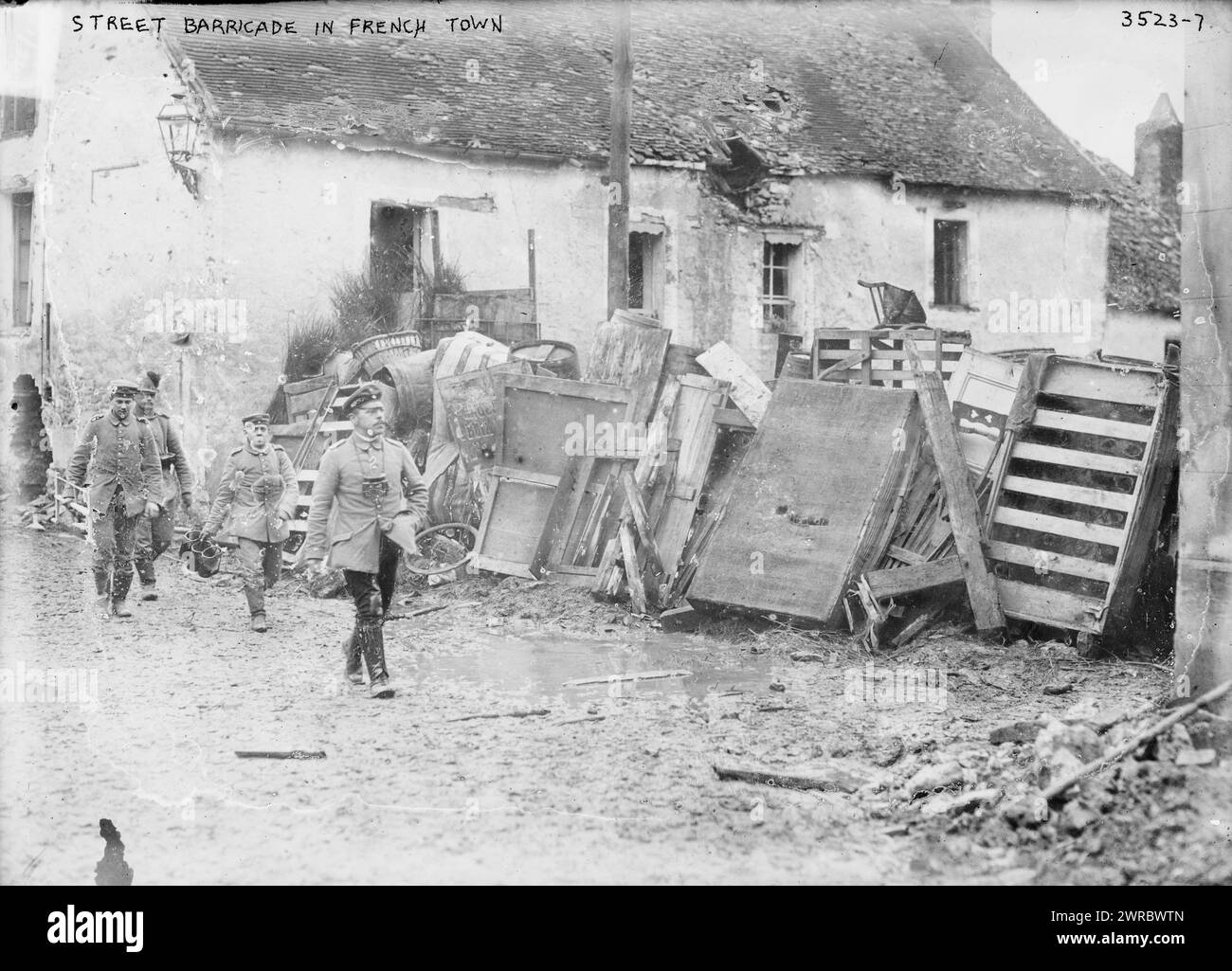 Street barricade in French town, Photograph shows a barricade in a ...