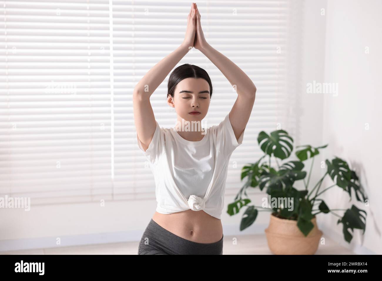 Crescent pose high lunge hi-res stock photography and images - Alamy