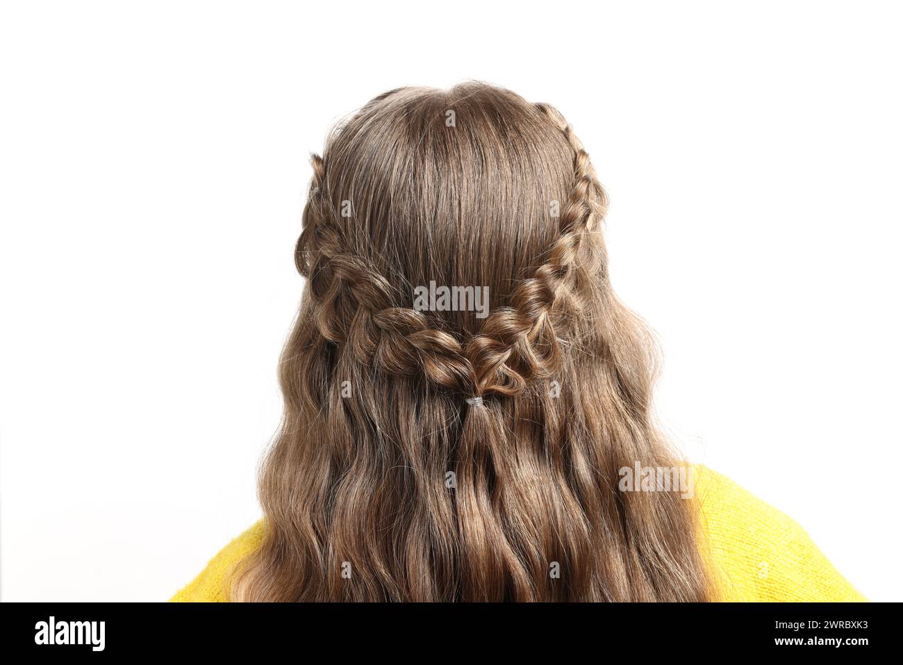 Little girl with braided hair on white background, back view Stock ...