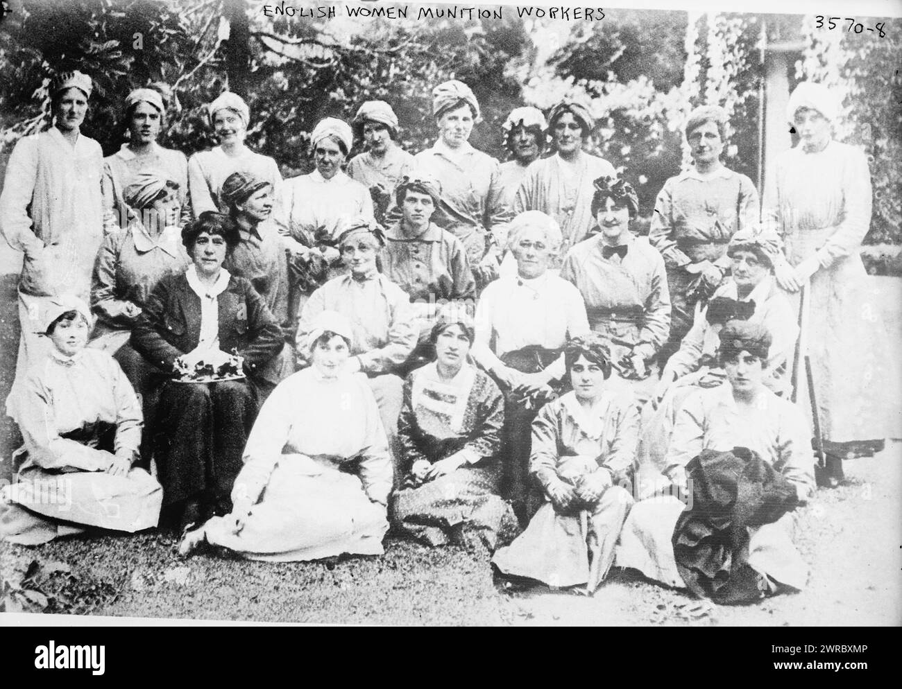 English women munition workers, Photograph shows a group portrait of ...