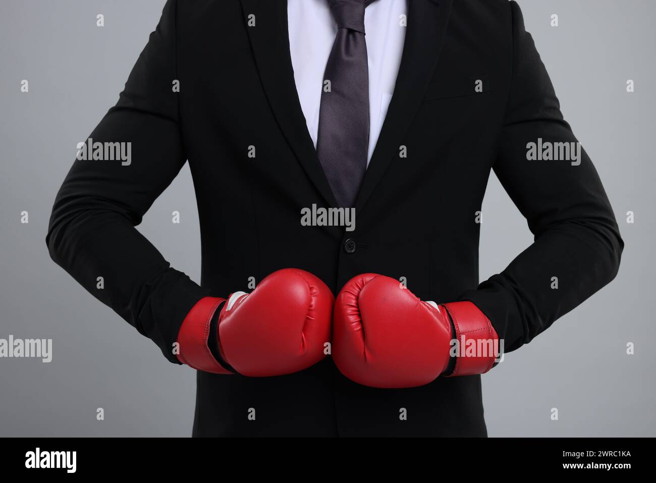 Man in suit wearing boxing hi-res stock photography and images - Alamy