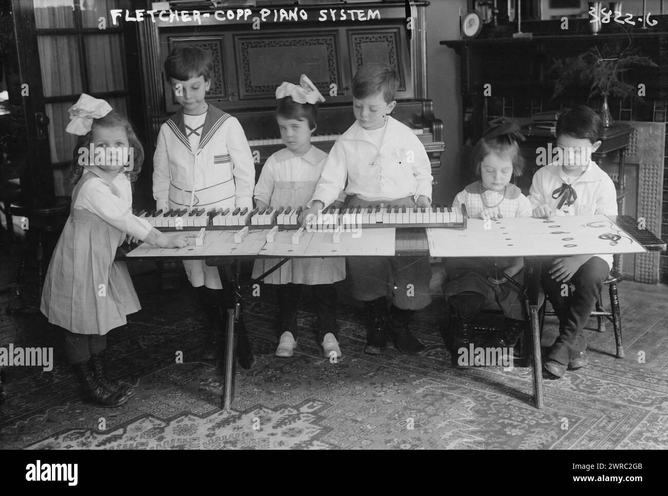 Fletcher - Copp piano system, Photograph shows children playing on ...