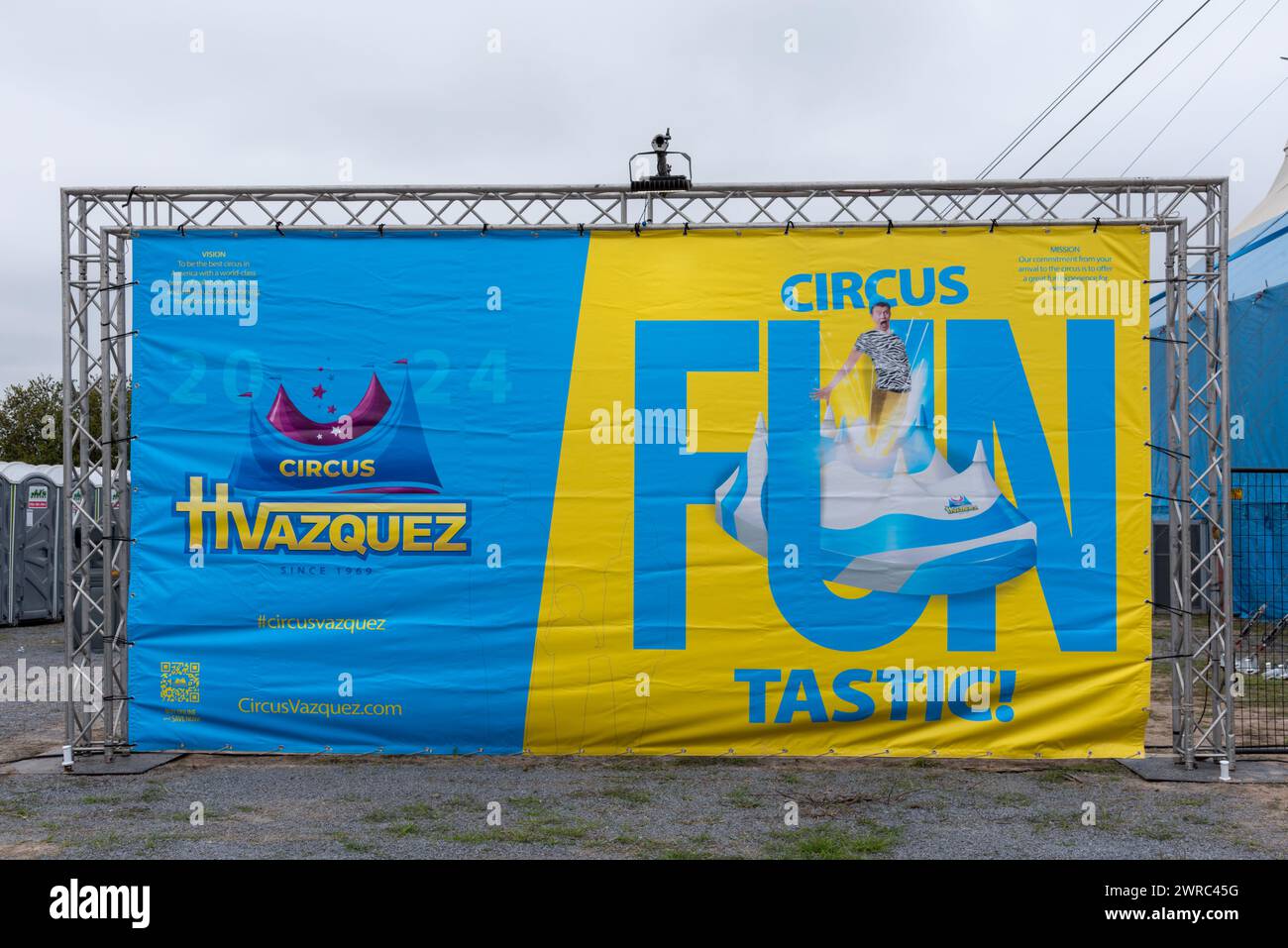 Blue and yellow sign for Circus Vazquez with the word Fantastic ...