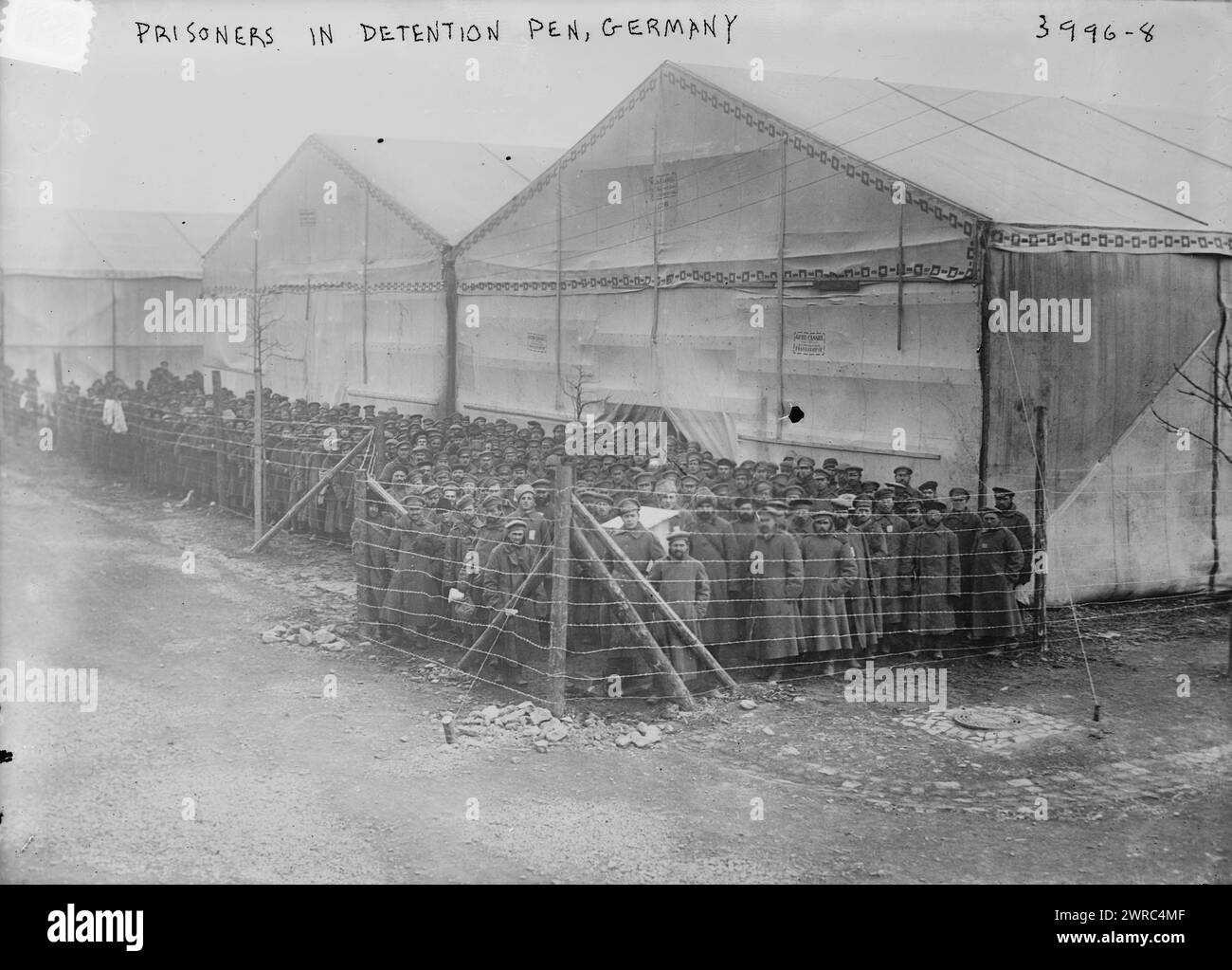 Prisoners in detention pen hi-res stock photography and images - Alamy