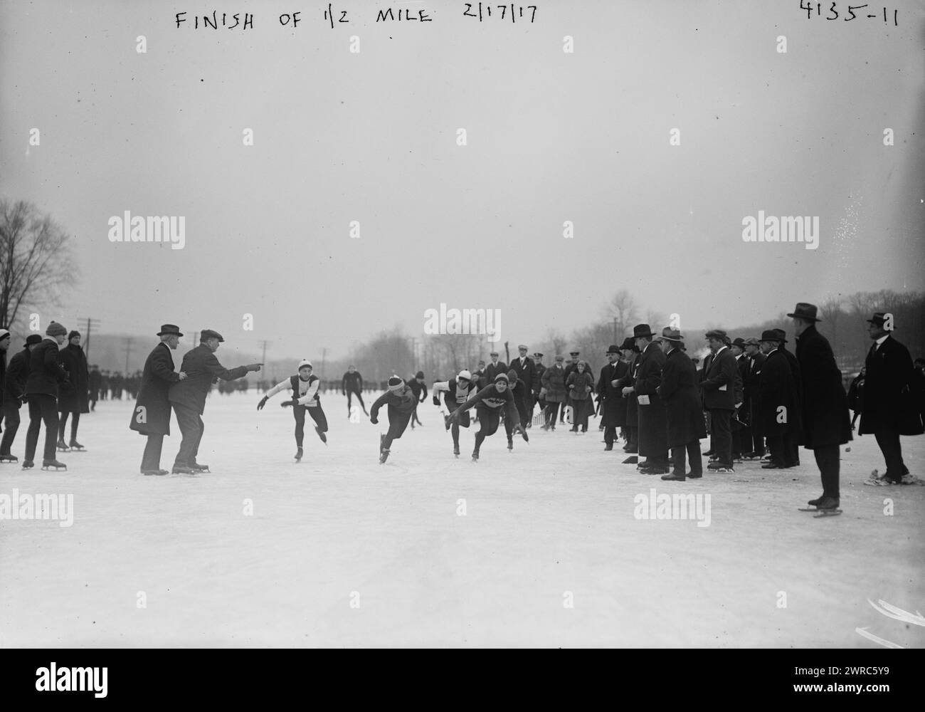Finish of 1/2 mile, Photograph shows the finish of an ice skating race ...