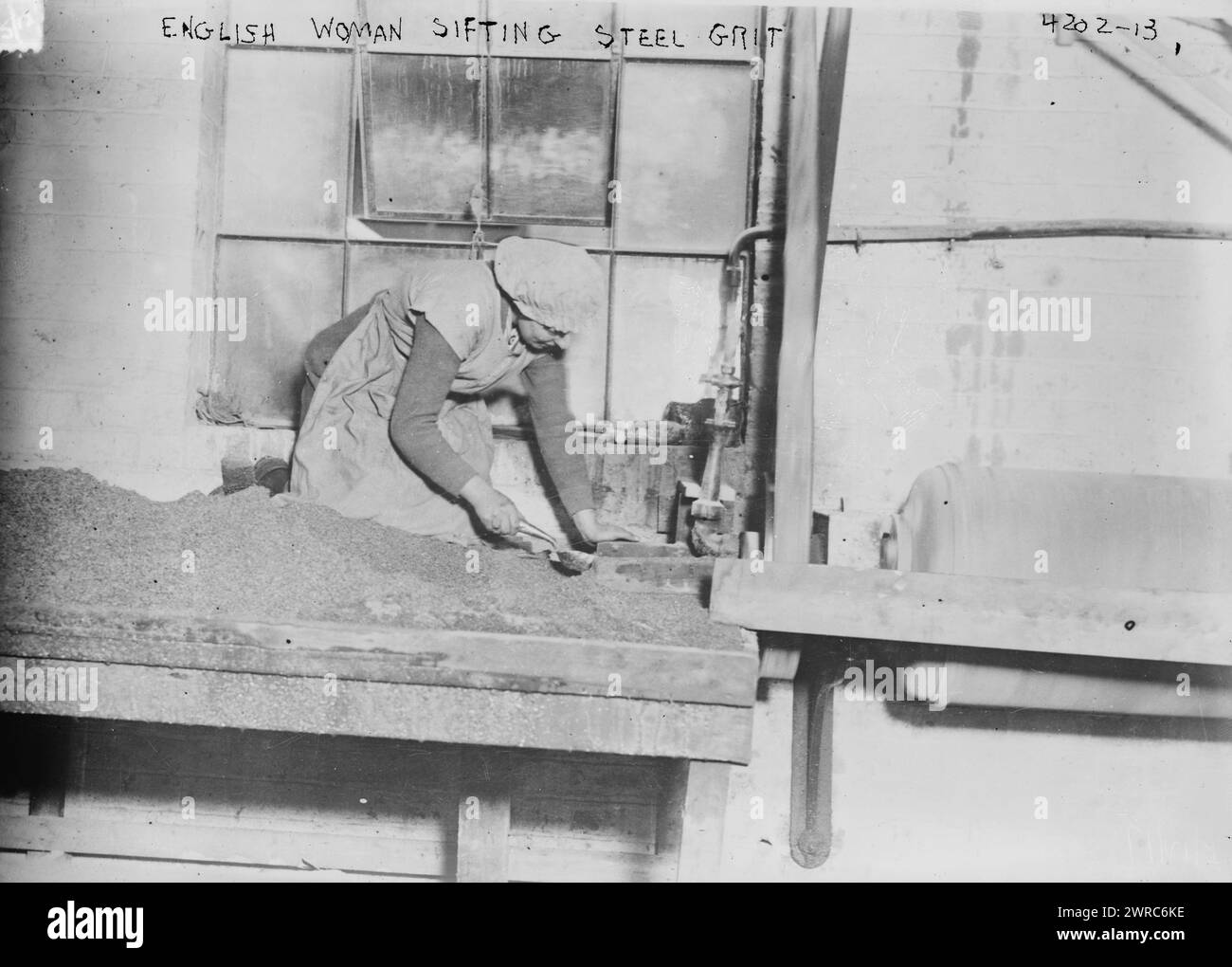 English women sifting steel grit, Photograph shows woman working in ...