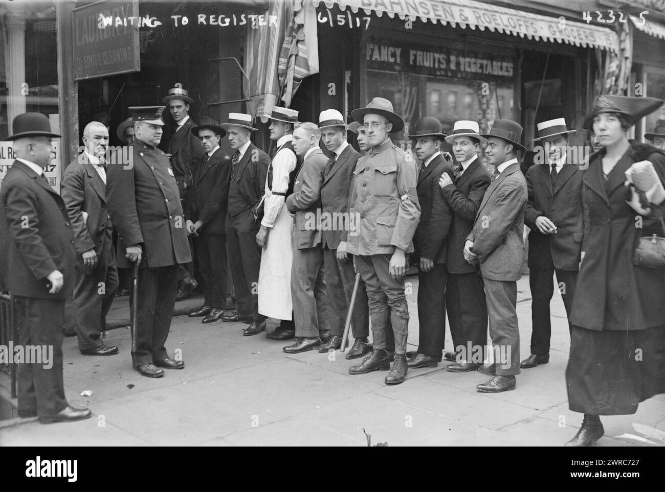 Waiting to register, 6/5/17, Photograph shows line of men next to ...