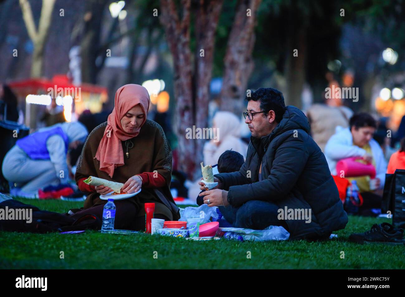 Istanbul, Turkey. 11th Mar, 2024. Muslims break their fast as dusk ...