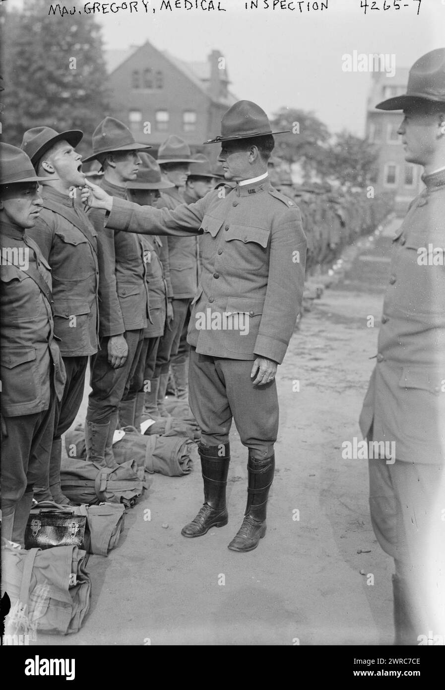 Maj. Gregory, Medical Inspection, Photograph shows Major Gregory doing ...